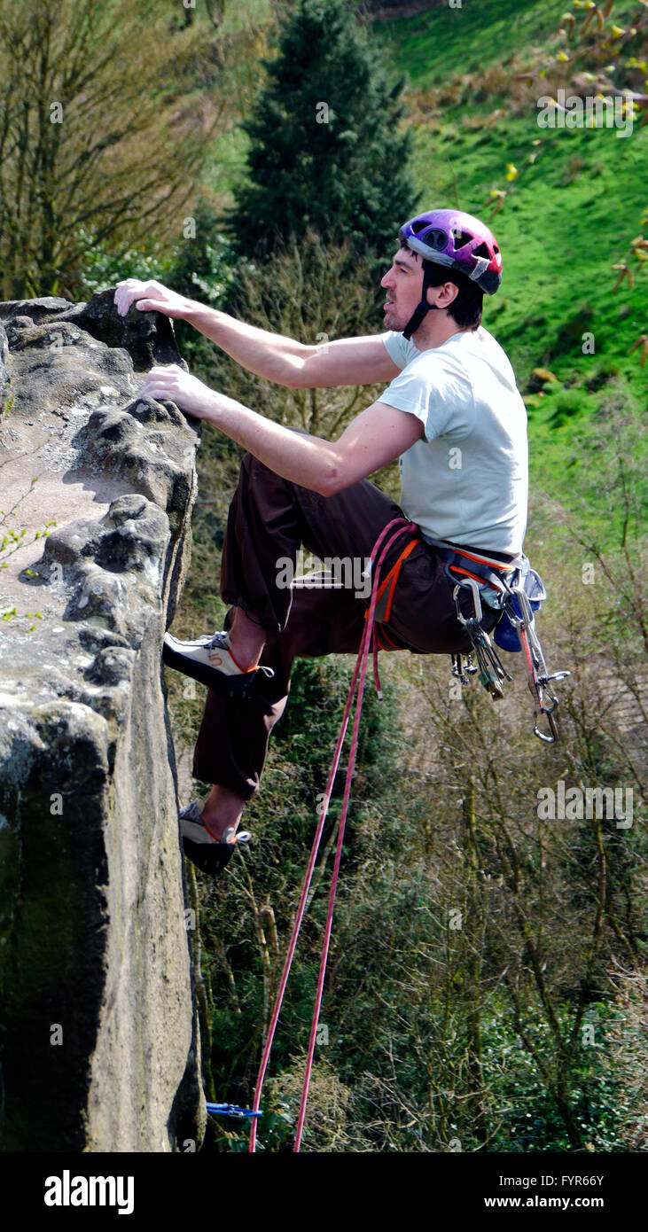 Rock climbers climbing at Robin Hood's Stride, Cratcliffe, Cliff Lane ...