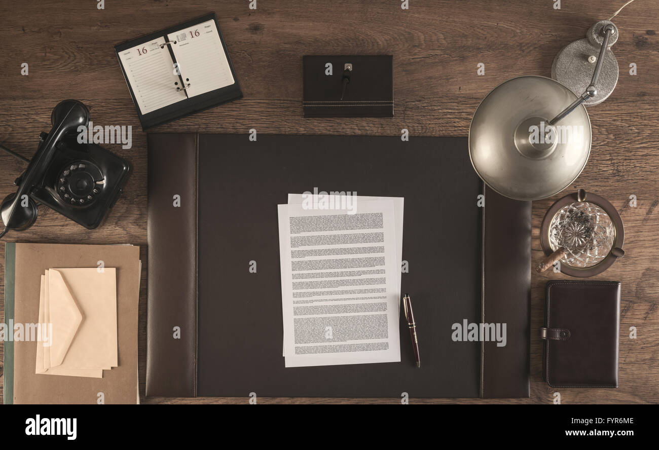 1950s style office with a contract and a pen, top view Stock Photo - Alamy