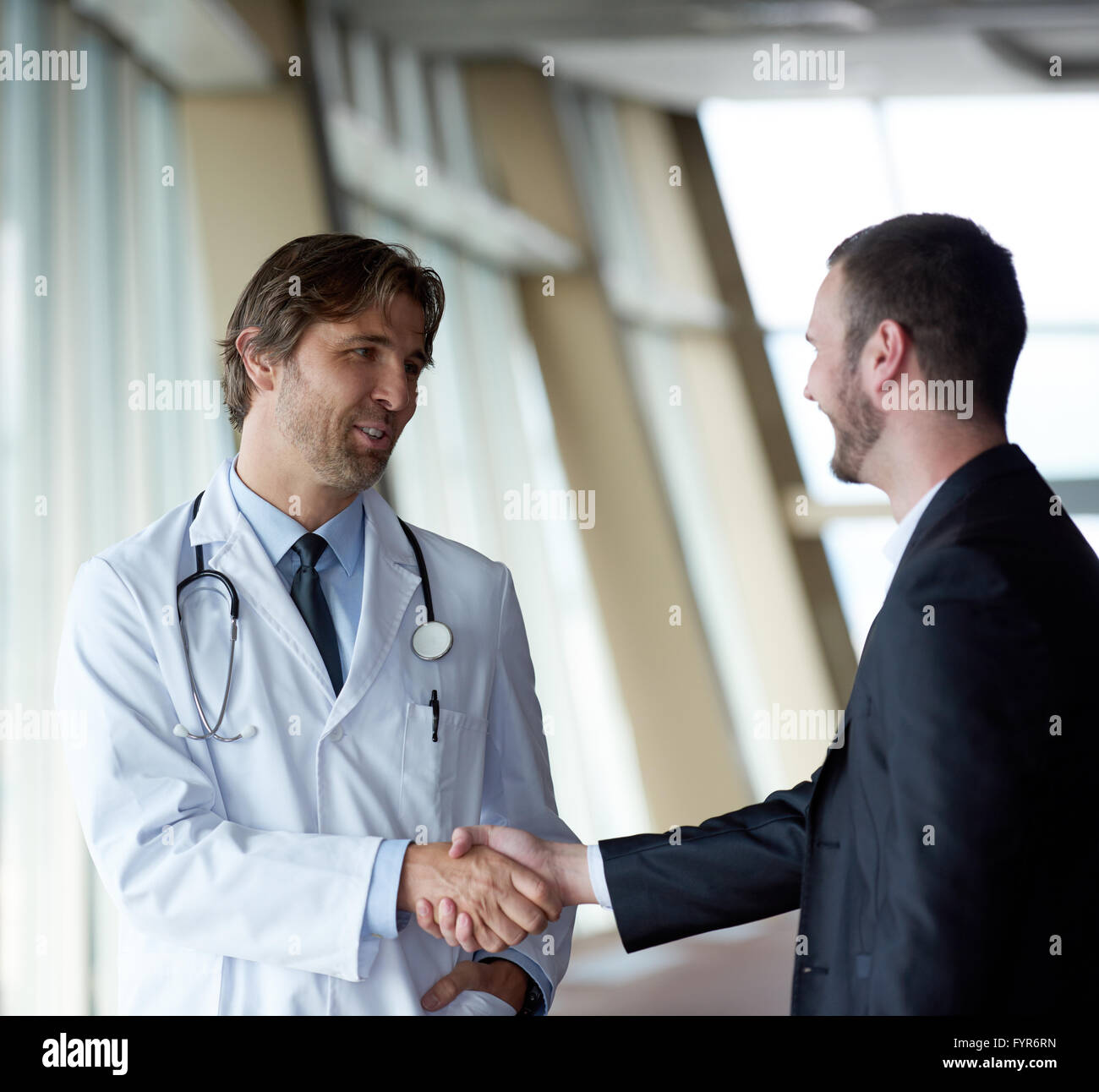 doctor handshake with a patient Stock Photo - Alamy