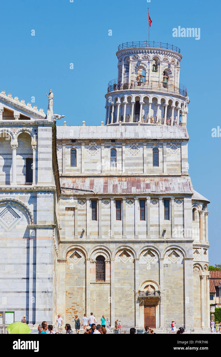 The Leaning Tower shows its angle of tilt from behind Pisa Cathedral ...