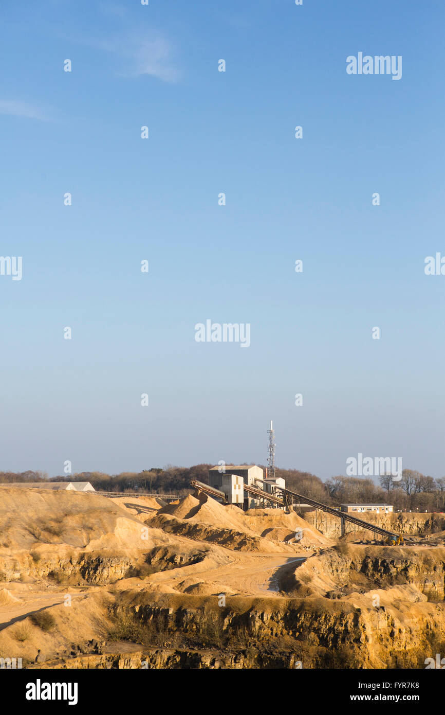 Looking out over a large old stone quarry Stock Photo - Alamy