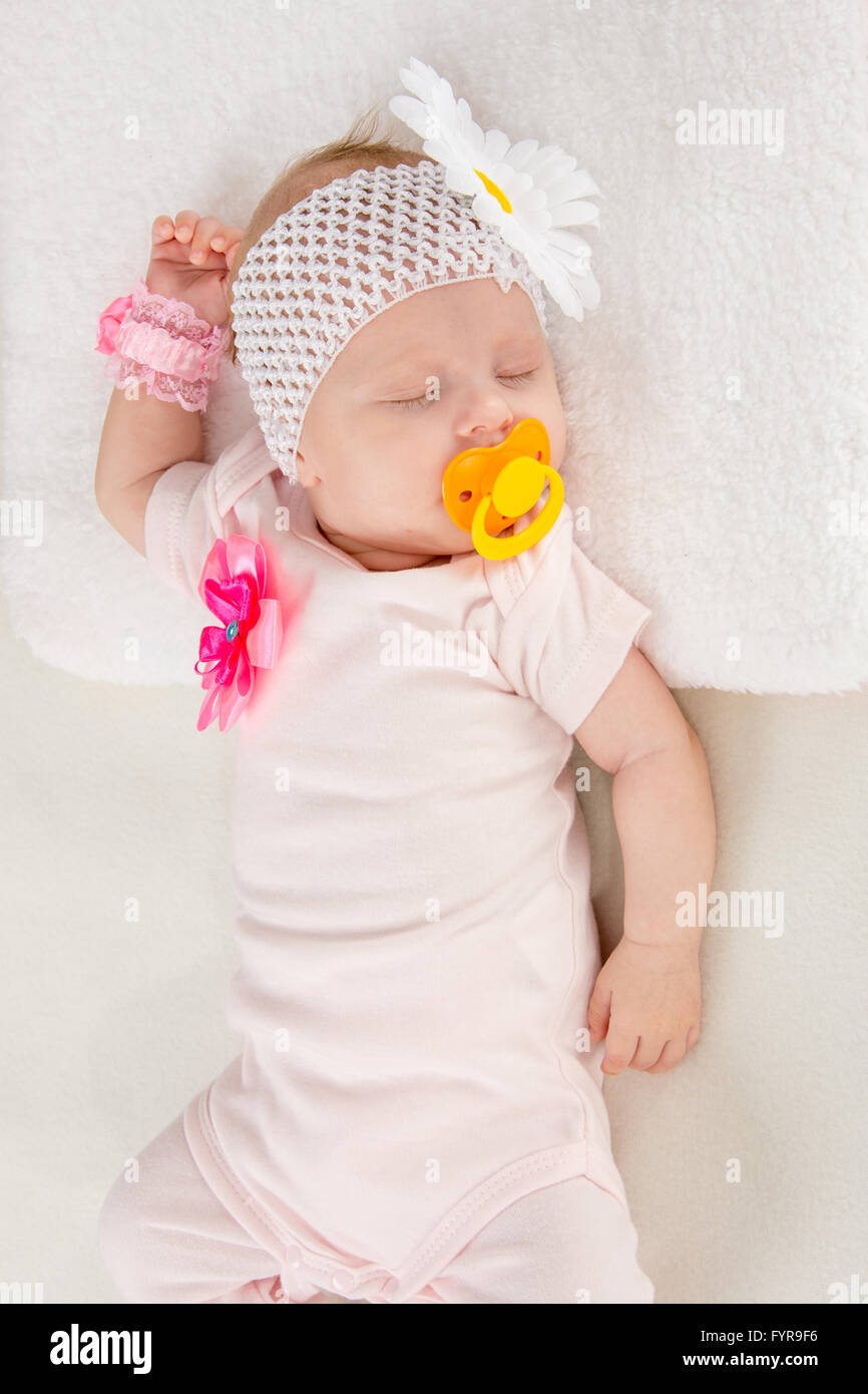Half-length portrait of two months sleeping girl Stock Photo - Alamy