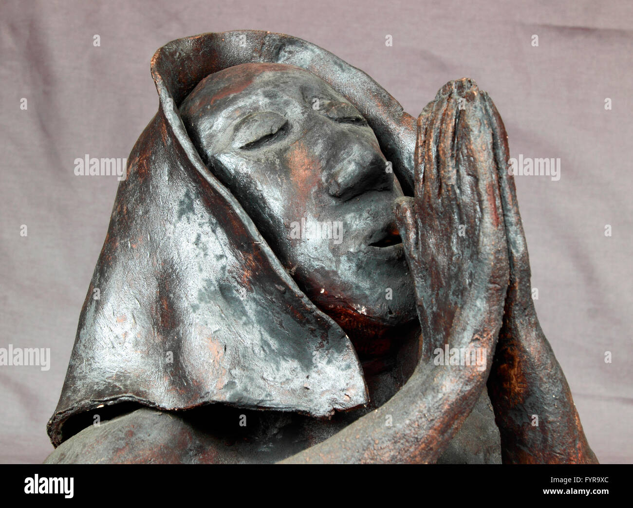 Ceramic head praying nun prayer bust pottery Stock Photo - Alamy