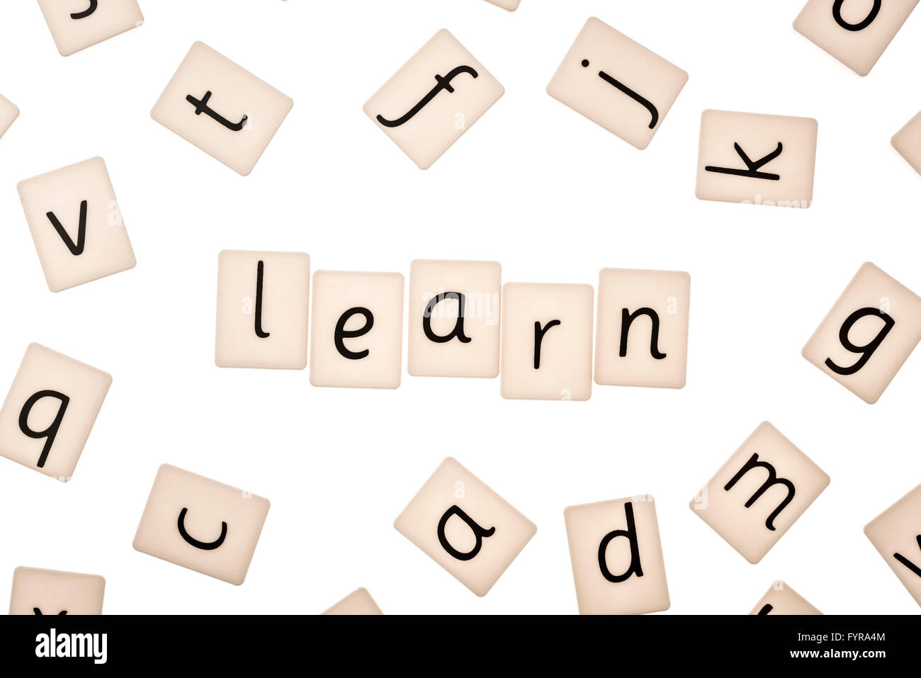 Plastic letters on white background spelling the word learn Stock Photo ...
