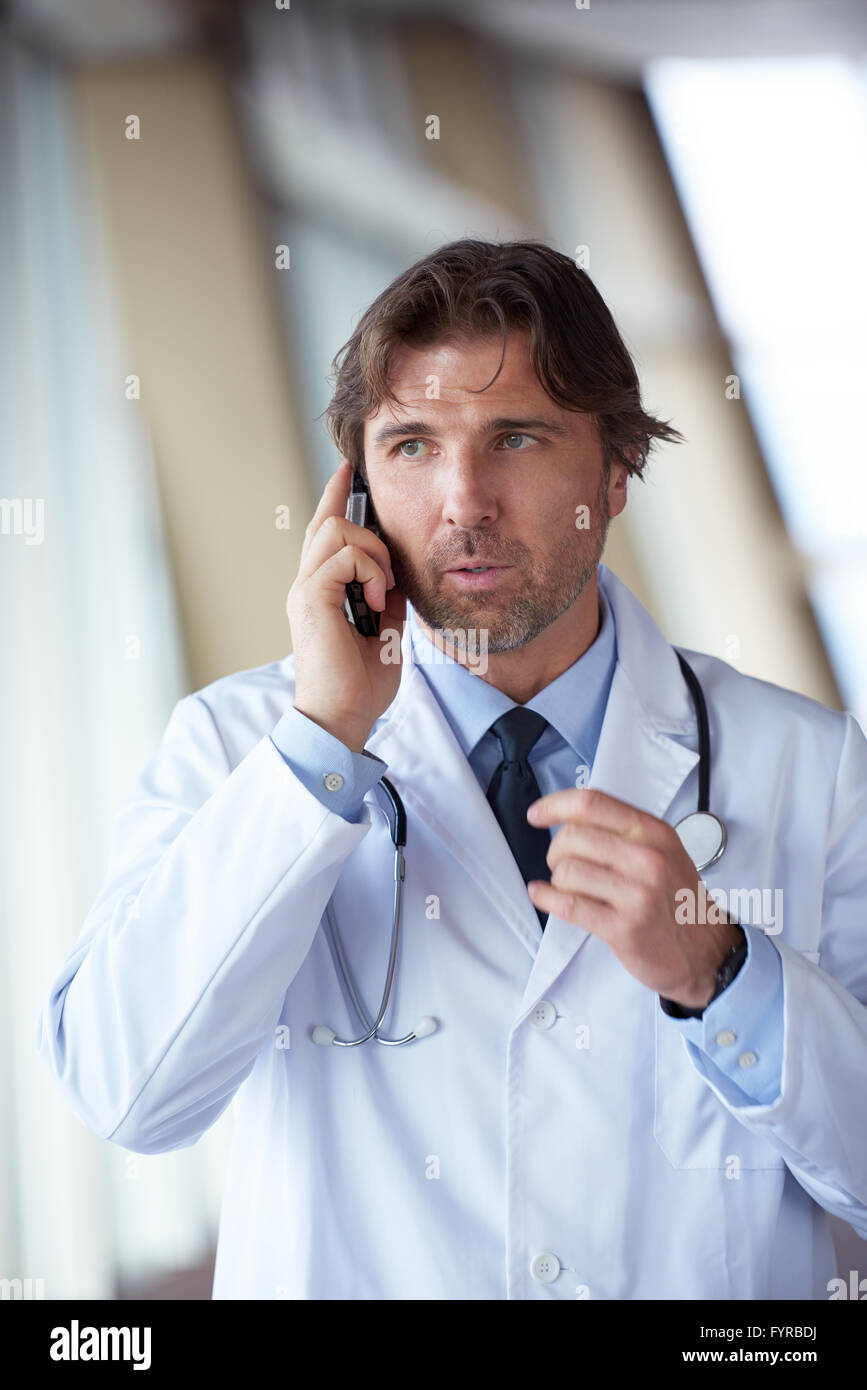 doctor speaking on cellphone Stock Photo - Alamy