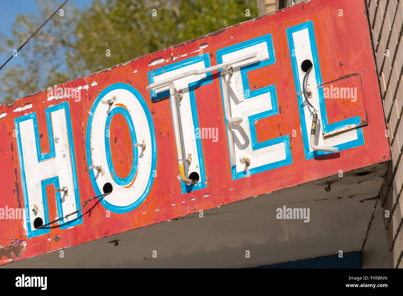 Vintage dilapidated Hotel Neon sign Stock Photo - Alamy