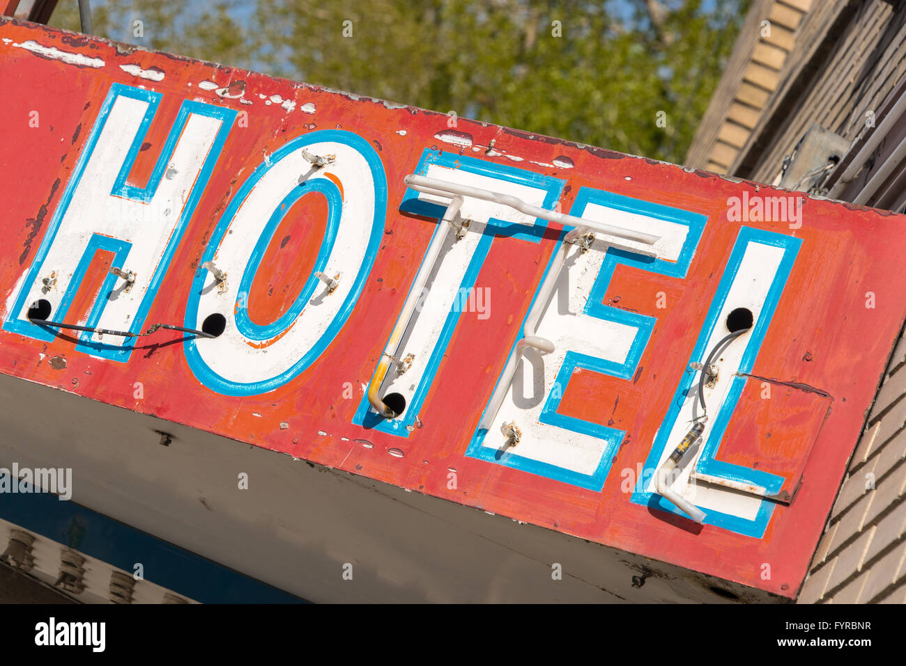 Vintage dilapidated Hotel Neon sign Stock Photo - Alamy