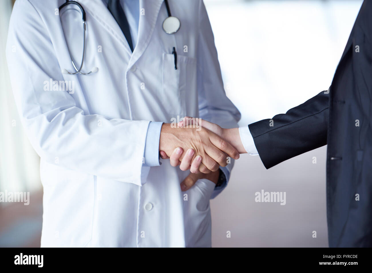 doctor handshake with a patient Stock Photo - Alamy