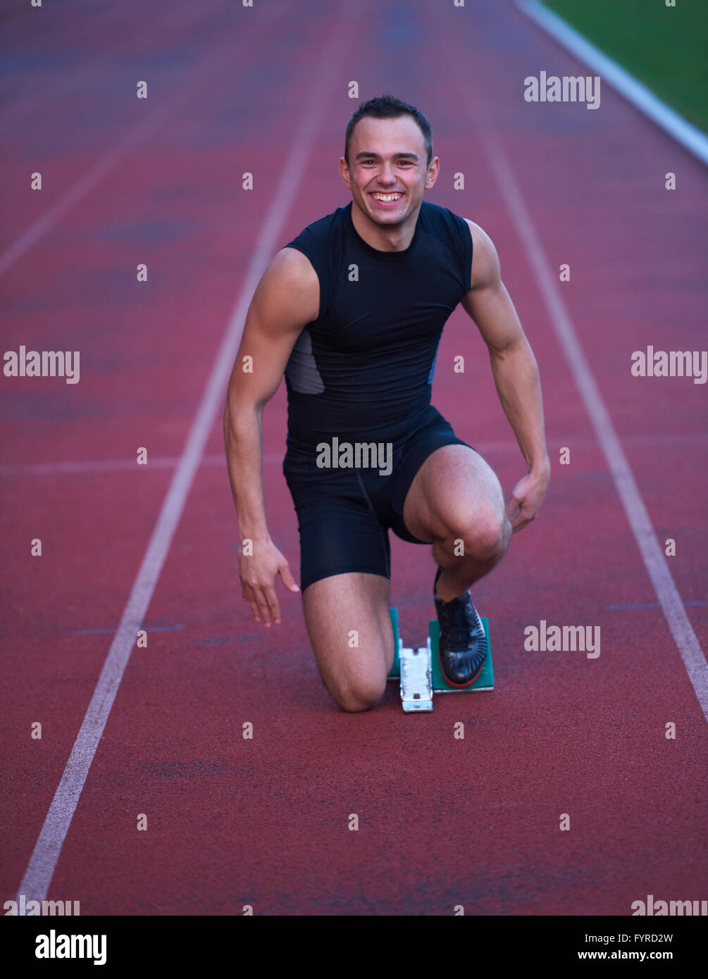 Athletic man start Stock Photo - Alamy
