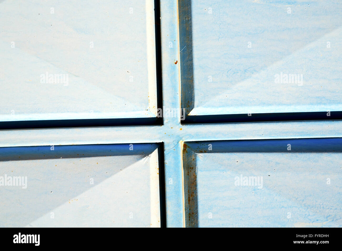 blue hinges in africa the old and safe padlock Stock Photo - Alamy