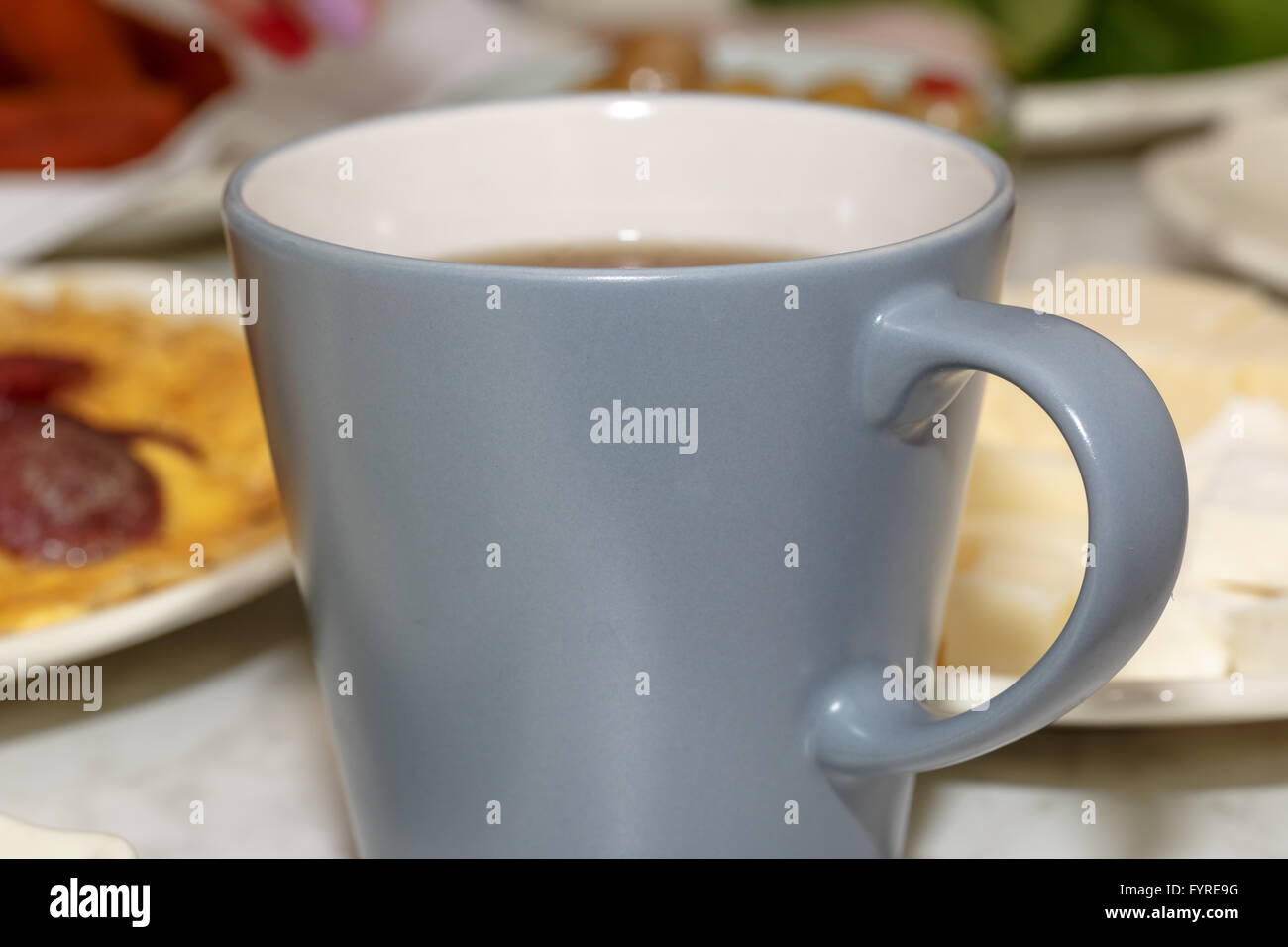 Close up detailed view of a mug with tea inside Stock Photo - Alamy