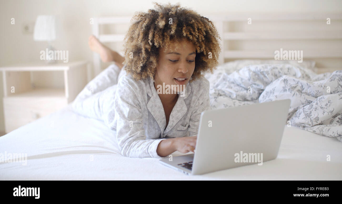 Laptop home bed hi-res stock photography and images - Alamy
