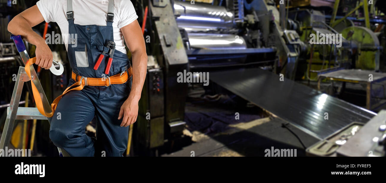 Worker with instruments Stock Photo - Alamy
