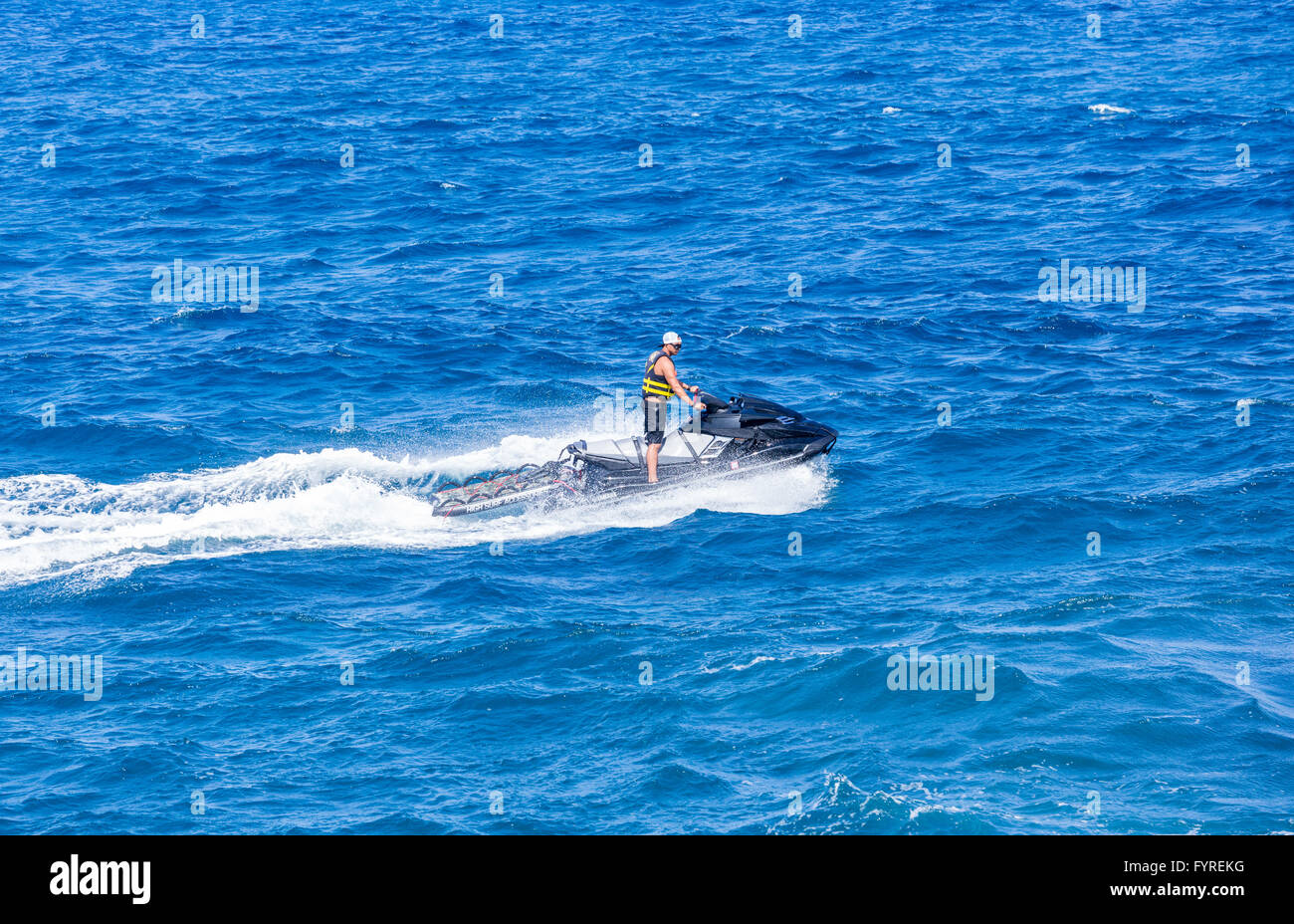 Adult man steers Yamaha Wave Runner at sea Stock Photo - Alamy