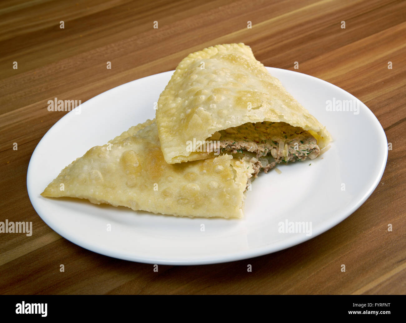 Cheburek with meat Stock Photo - Alamy