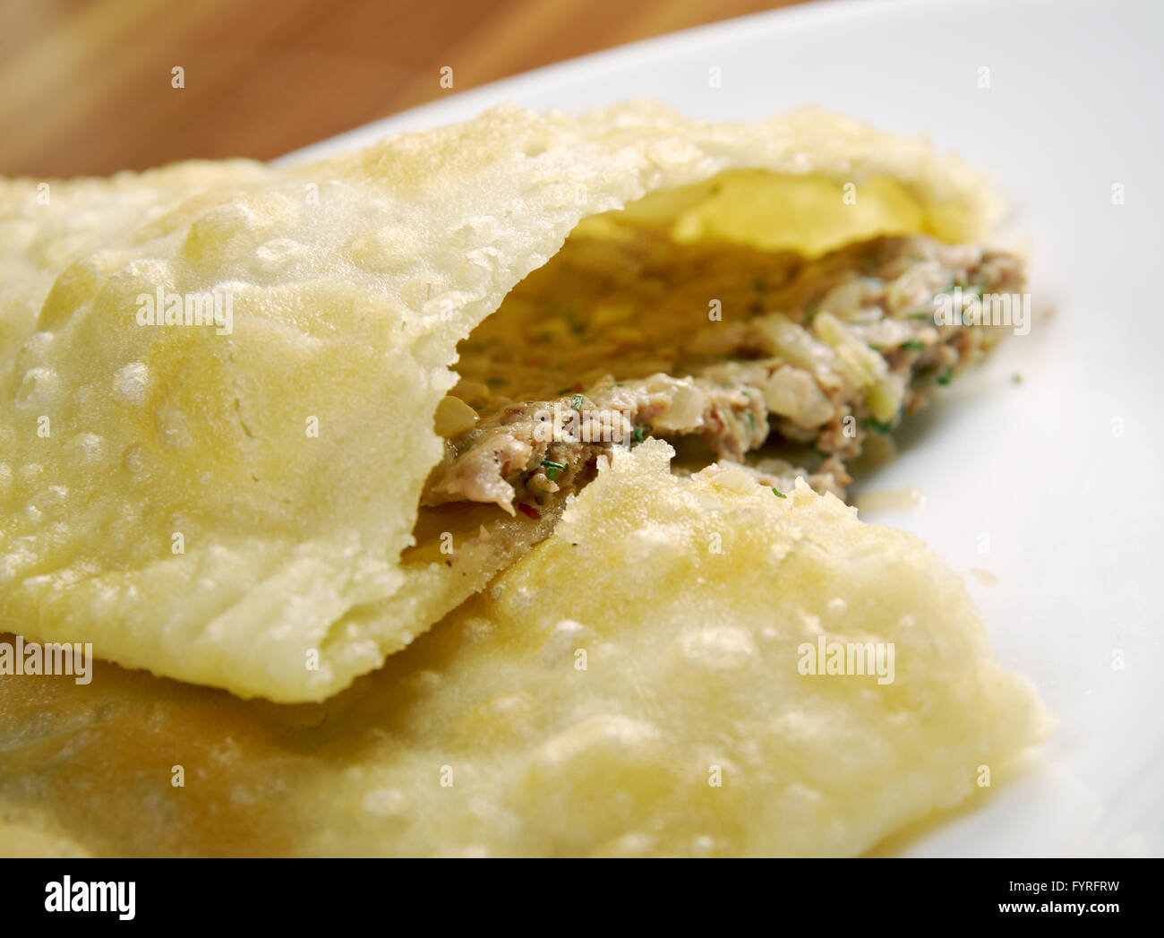 Cheburek with meat Stock Photo - Alamy
