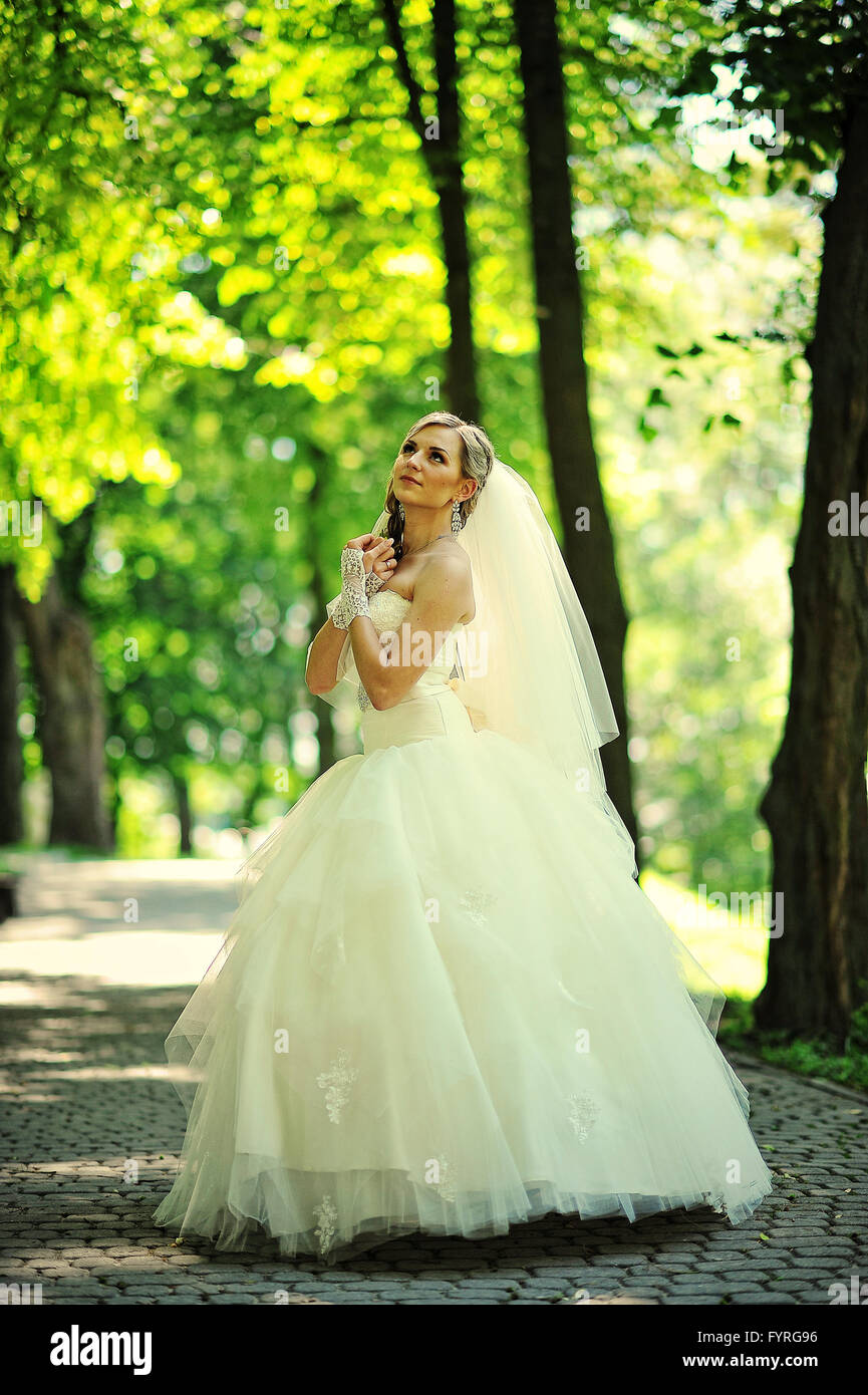 happy bride on the park Stock Photo - Alamy