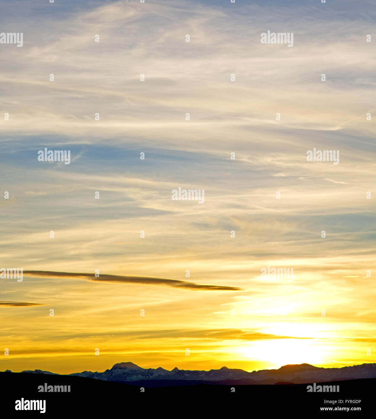 sunrise in the colored sky white sun Stock Photo - Alamy