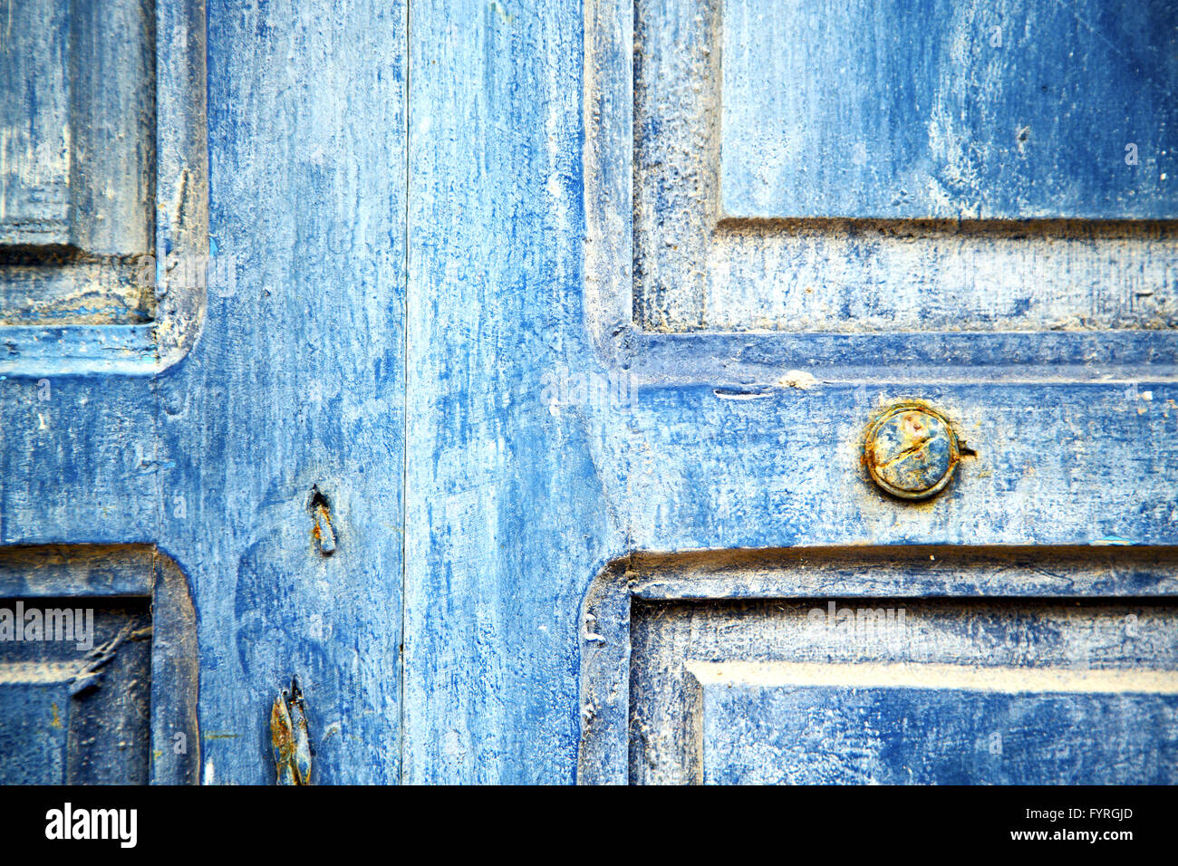 stripped in blue wood door and rusty nail Stock Photo - Alamy
