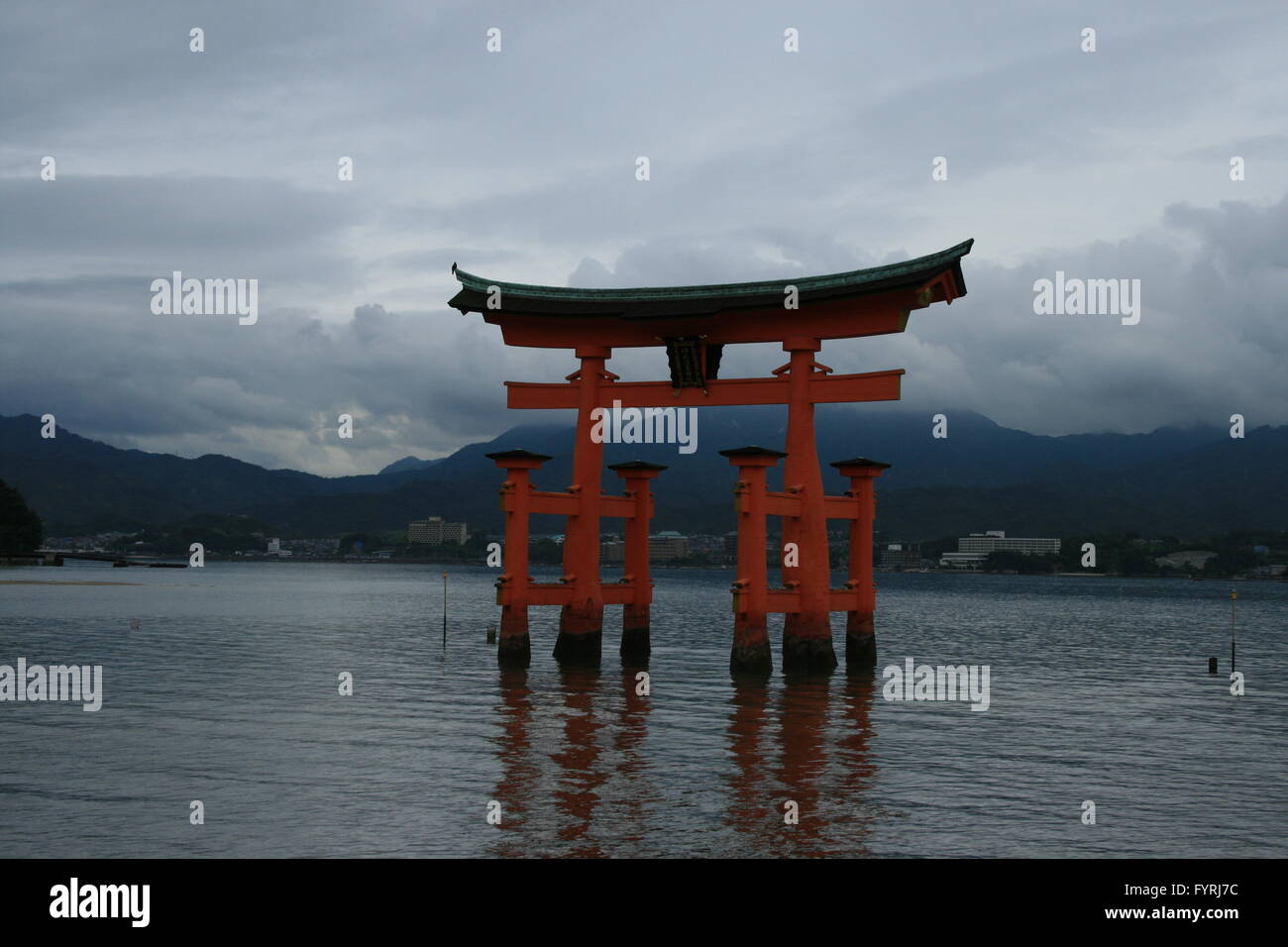 Japanese temple gate in water Stock Photo - Alamy