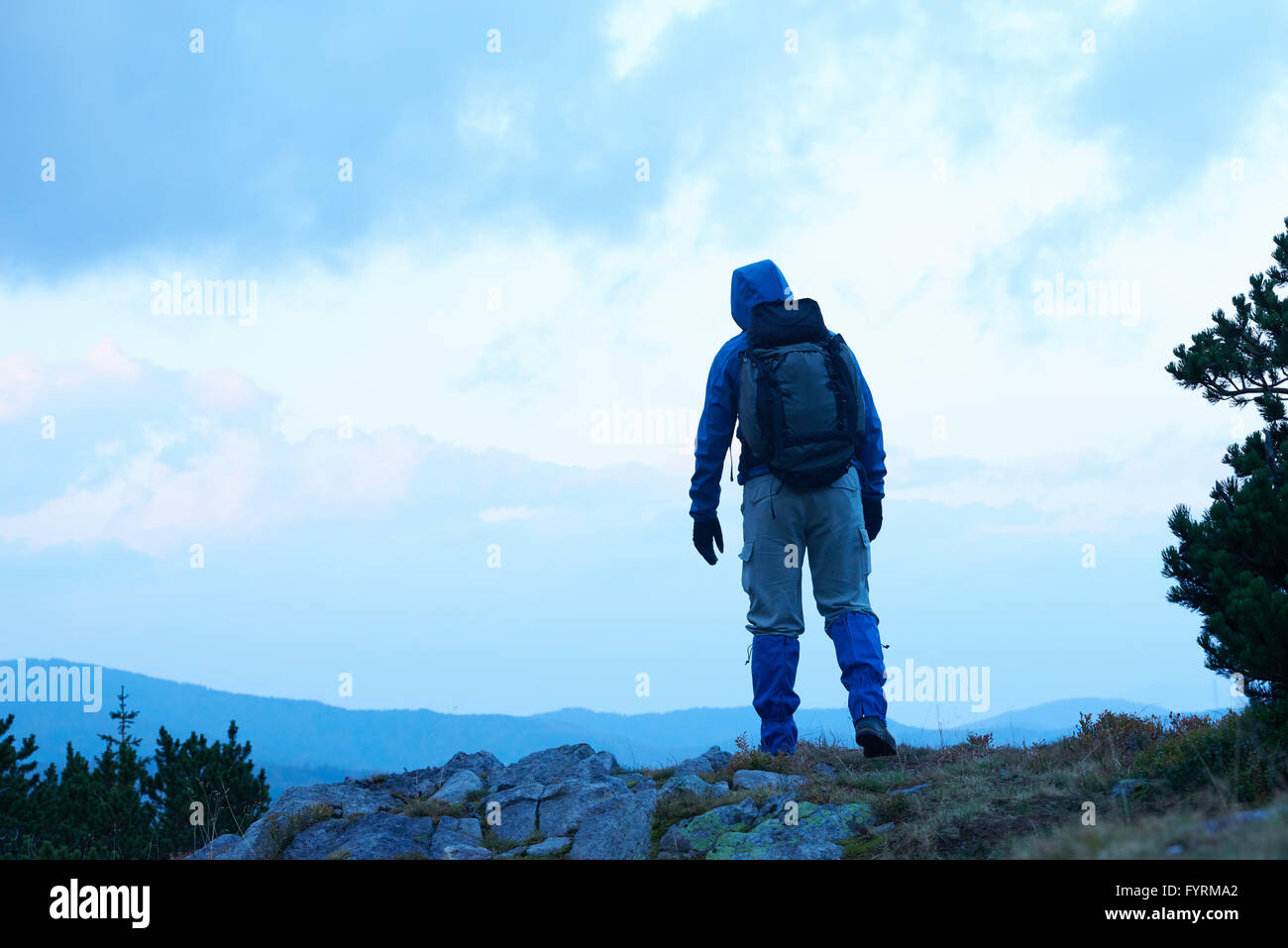 advanture man with backpack hiking Stock Photo - Alamy