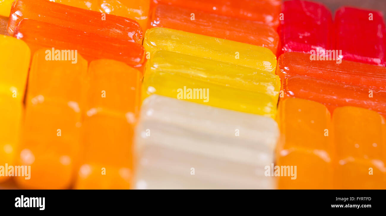 Closeup rectangular colorful shiny hard candy lined up Stock Photo - Alamy