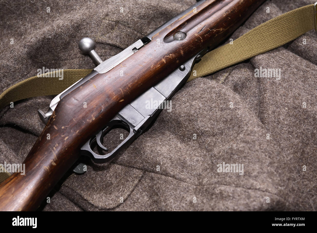 Old famous Russian military rifle on greatcoat background Stock Photo ...