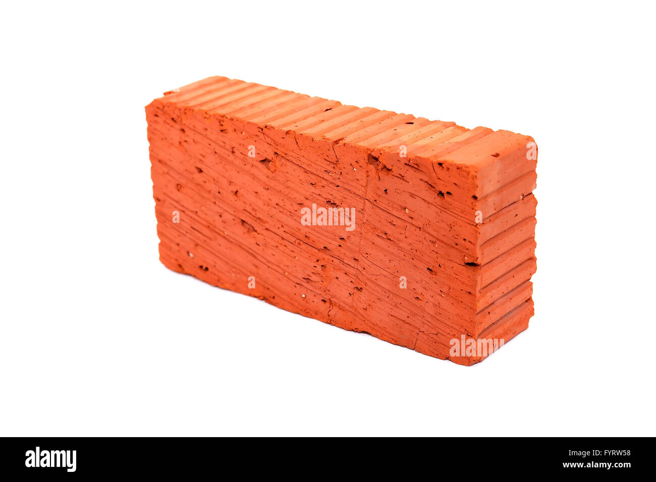 One ordinary red brick on white background Stock Photo - Alamy