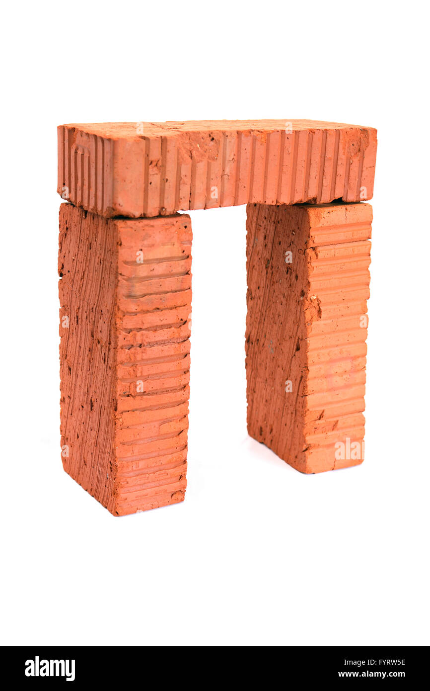 Three ordinary red bricks as gate on white background Stock Photo - Alamy