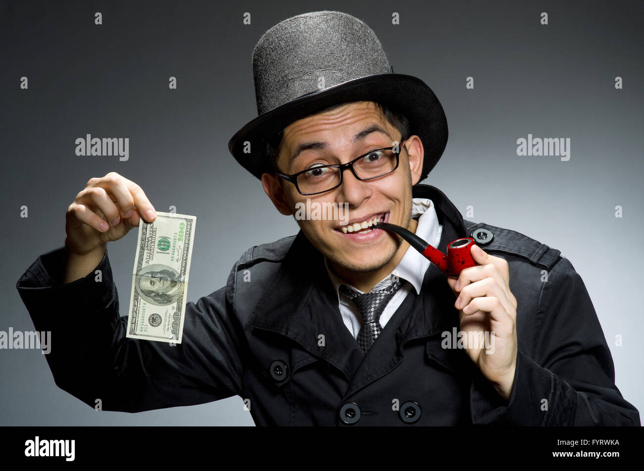 Young detective in black coat with money against gray Stock Photo - Alamy