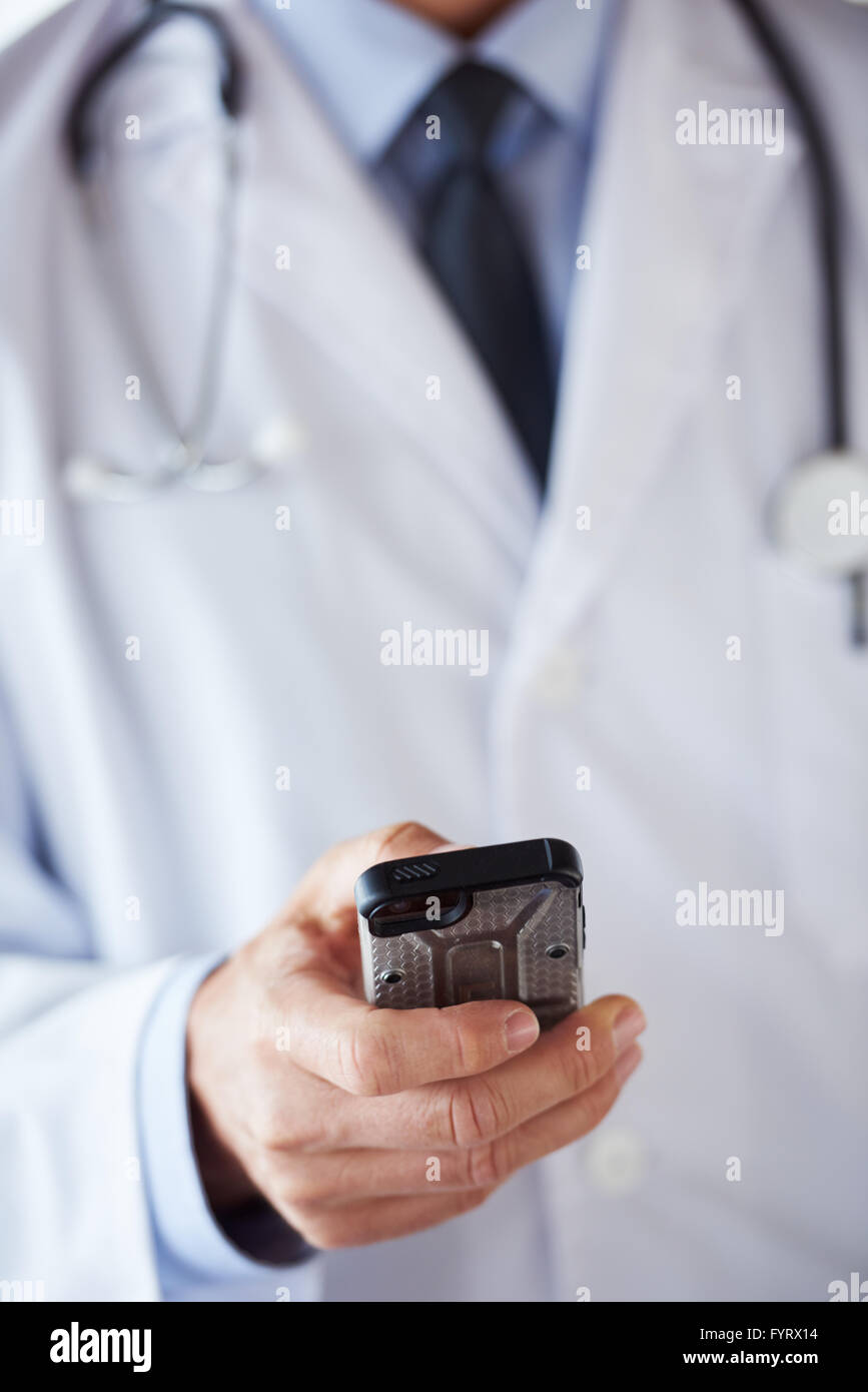 doctor speaking on cellphone Stock Photo - Alamy