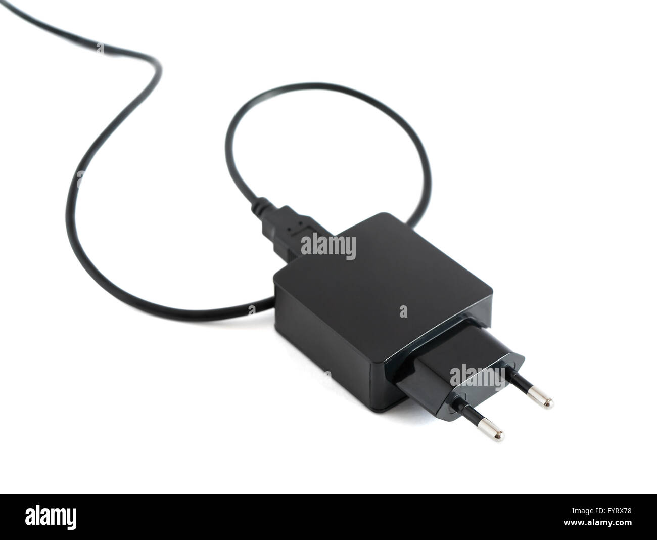 Black adapter plug with cable on white background Stock Photo - Alamy