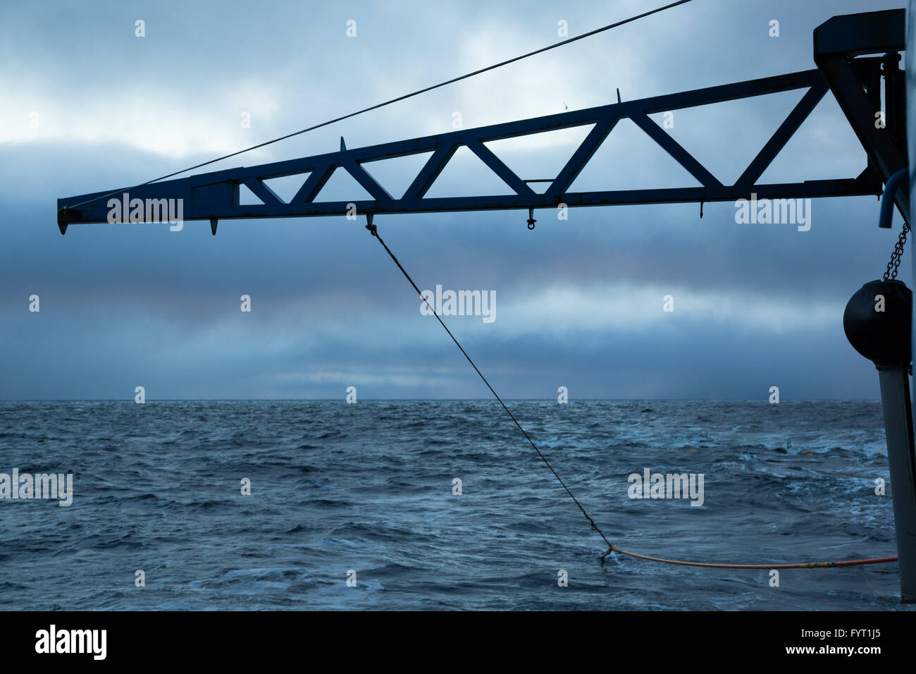 Remote beam with a rope bearing outboard equipment Stock Photo - Alamy