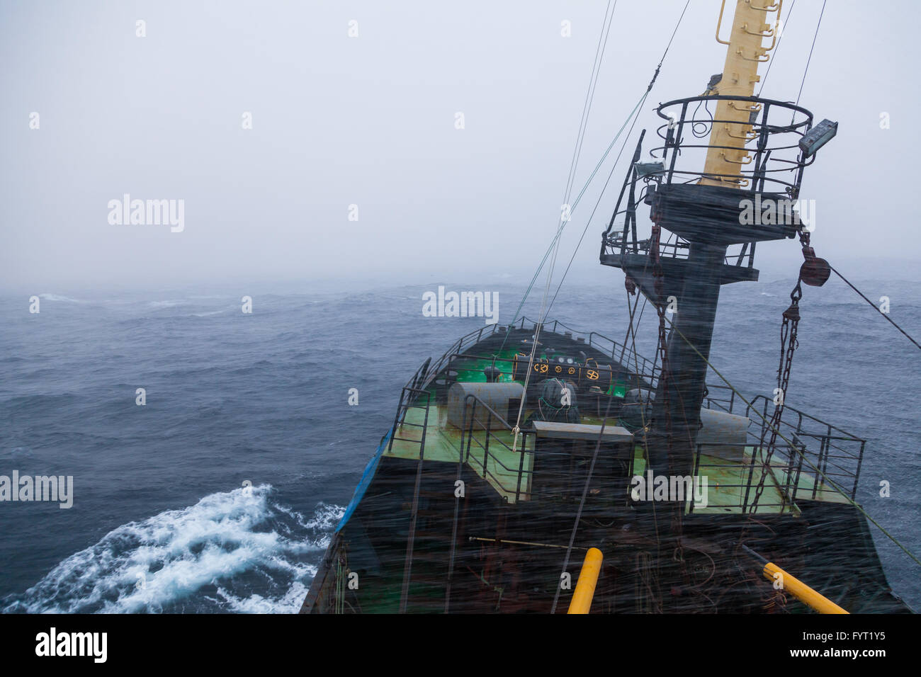 A ship in a storm and blizzard Stock Photo - Alamy
