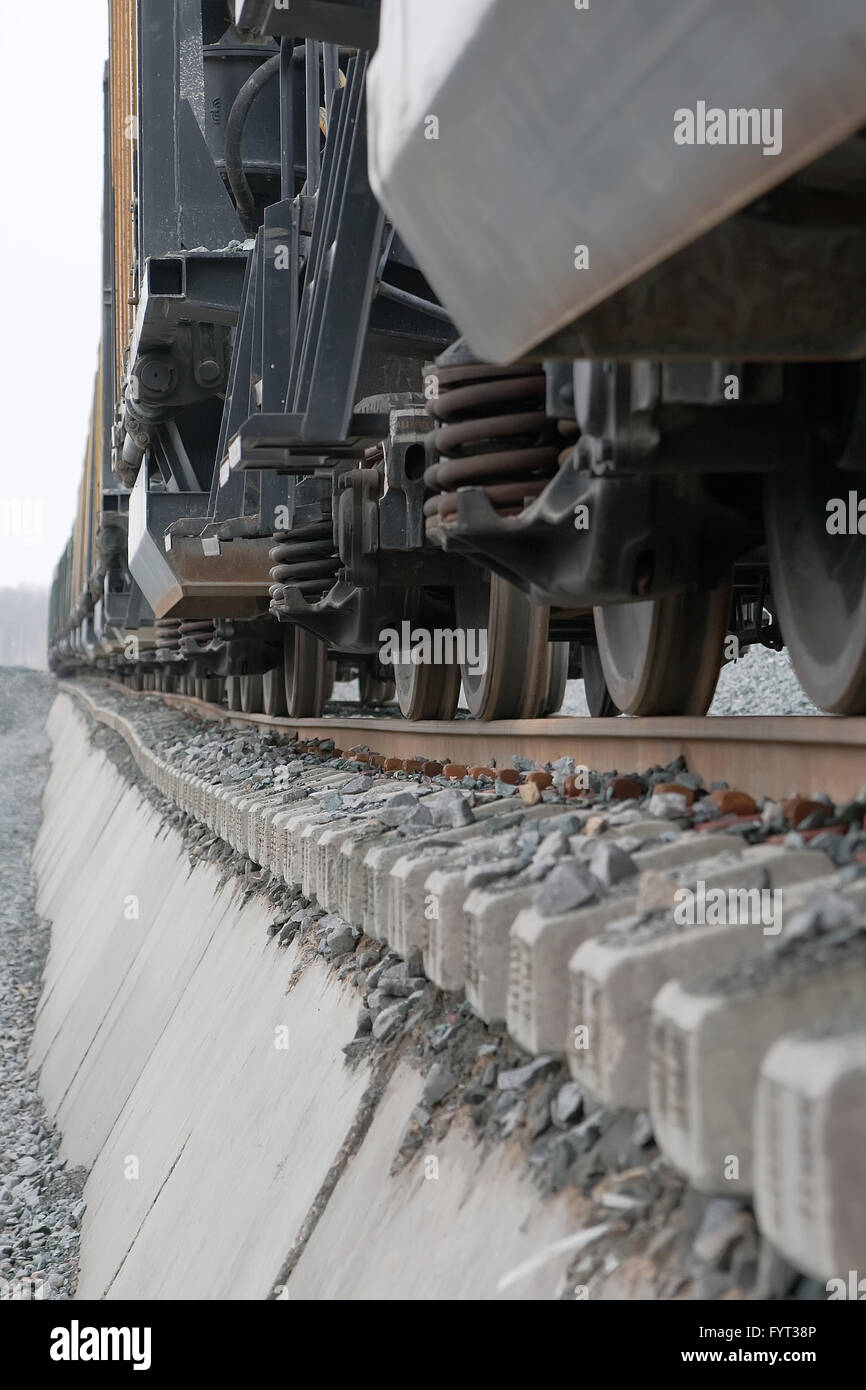 Railroad tracks and rolling stock wheelsets closeup Stock Photo - Alamy