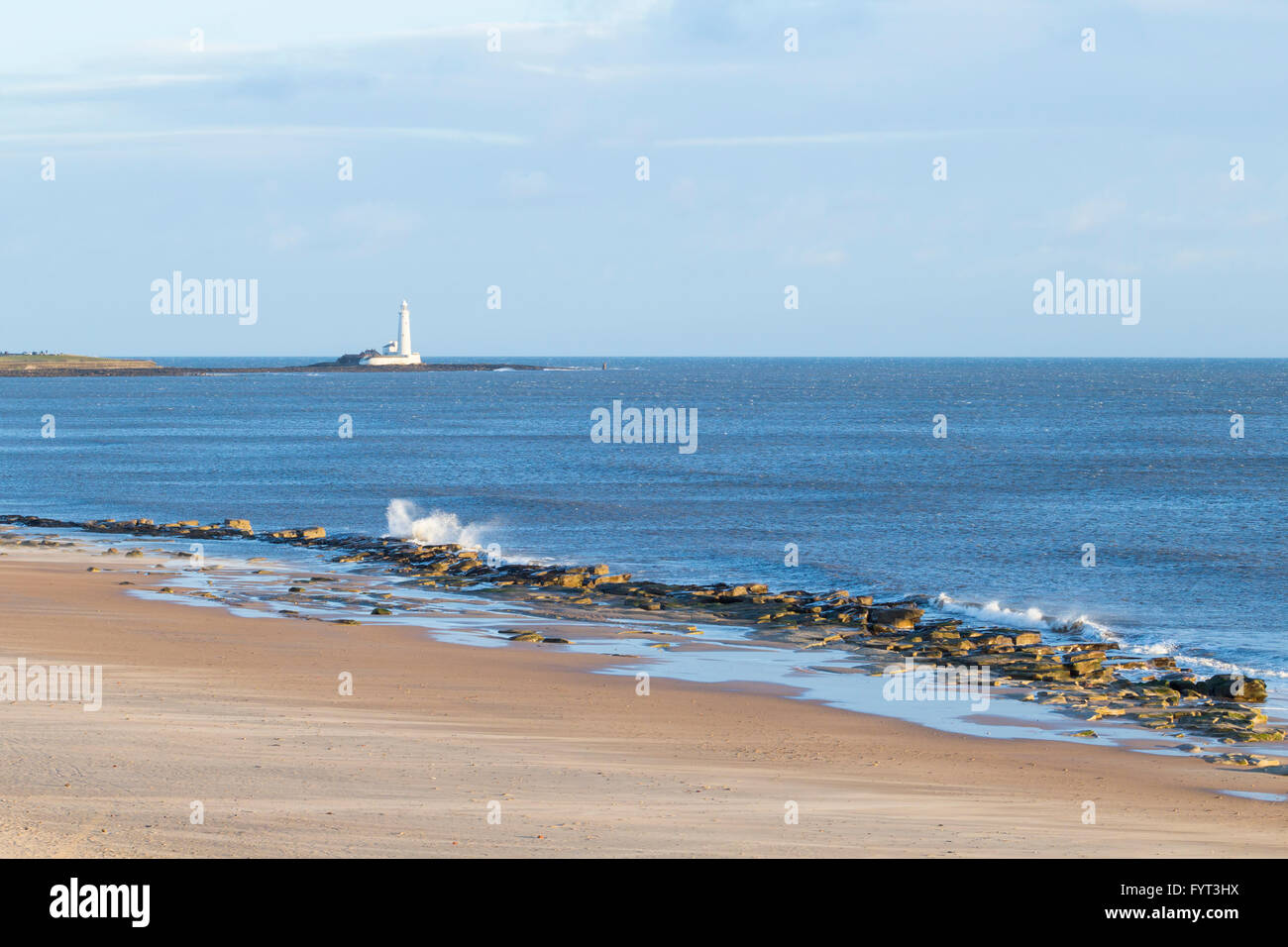View over Whitley Bay beach with St Mary`s Lighthouse in distance ...