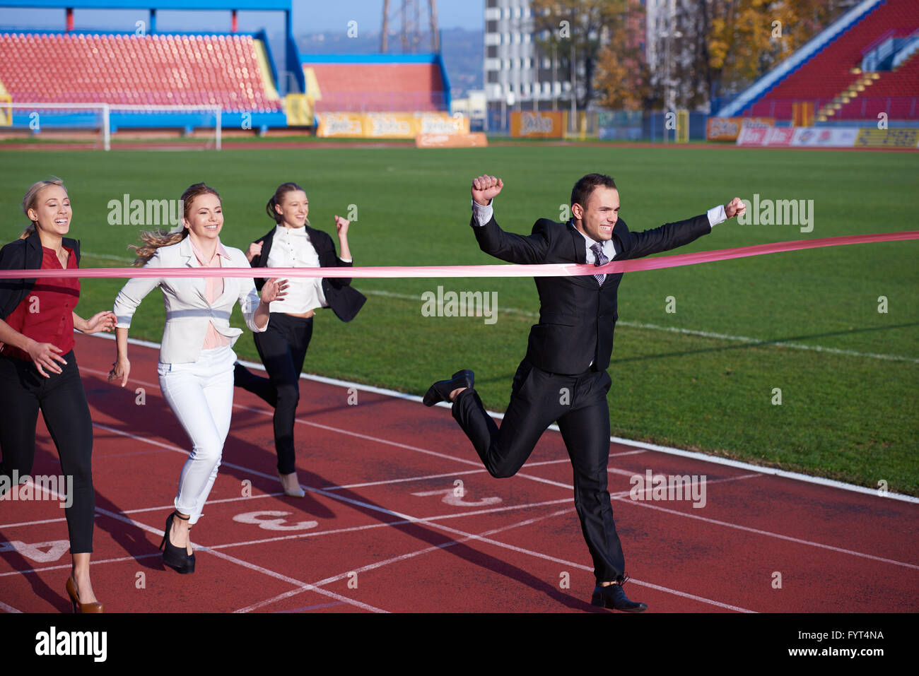 business people running on racing track Stock Photo - Alamy