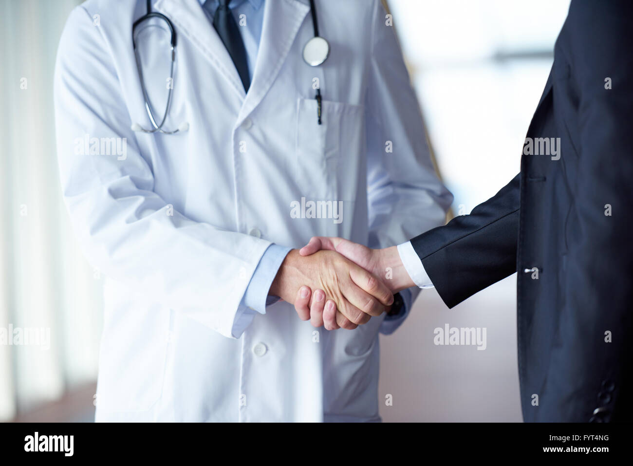 doctor handshake with a patient Stock Photo - Alamy