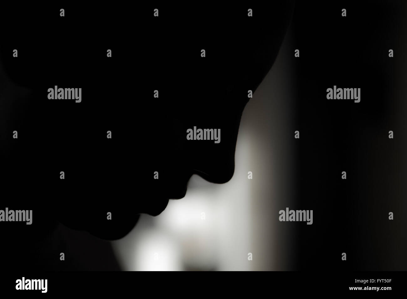 Face in shadow Stock Photo - Alamy