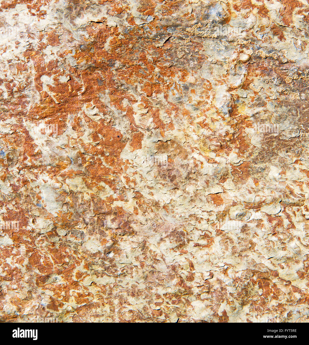 rocks stone and red orange gneiss in the wall of morocco Stock Photo ...