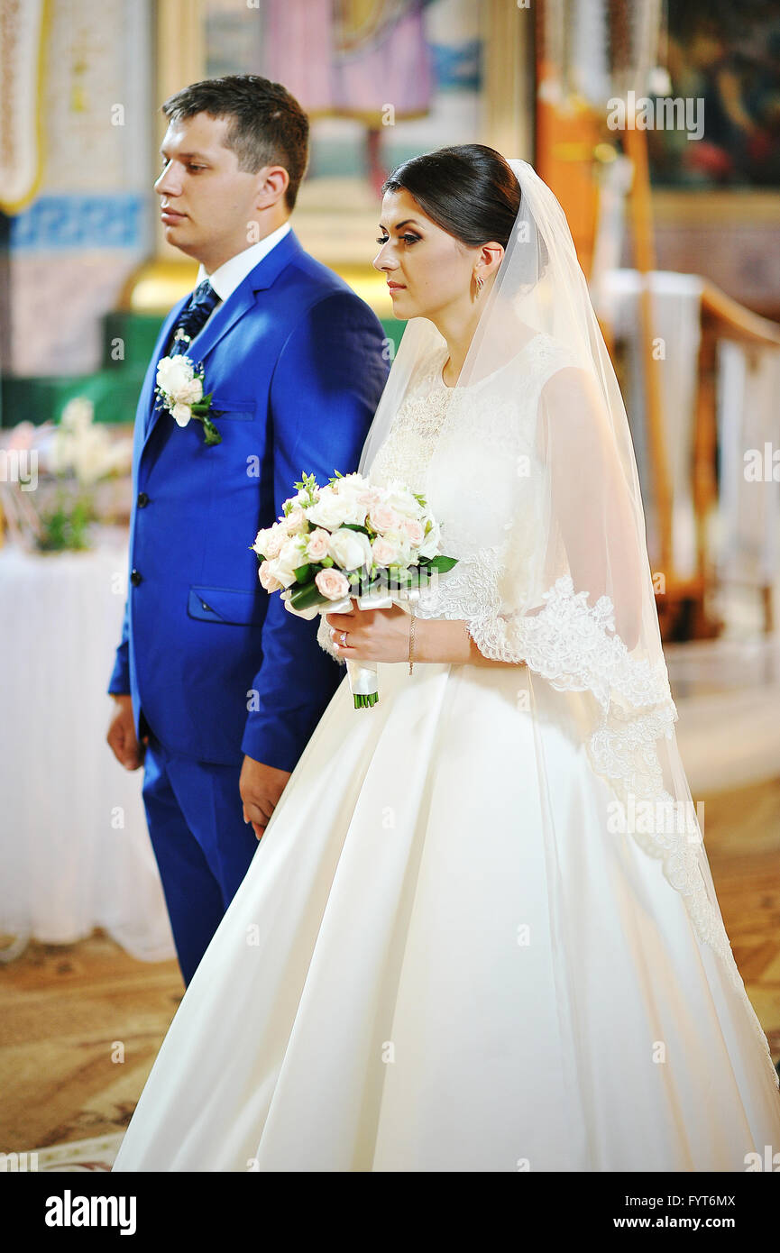 wedding couple at church Stock Photo - Alamy