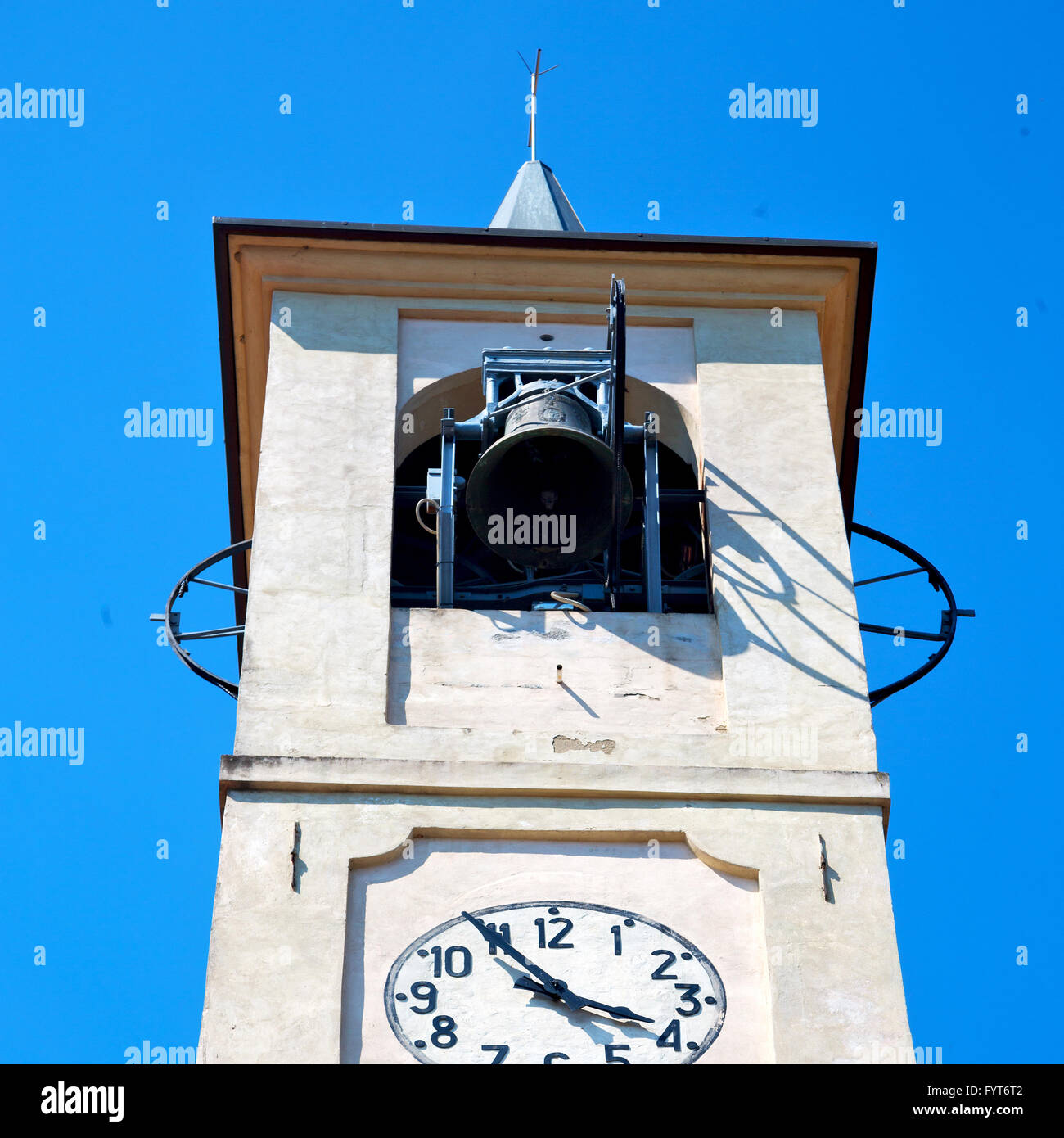 monument clock tower in italy europe old stone and bell Stock Photo - Alamy