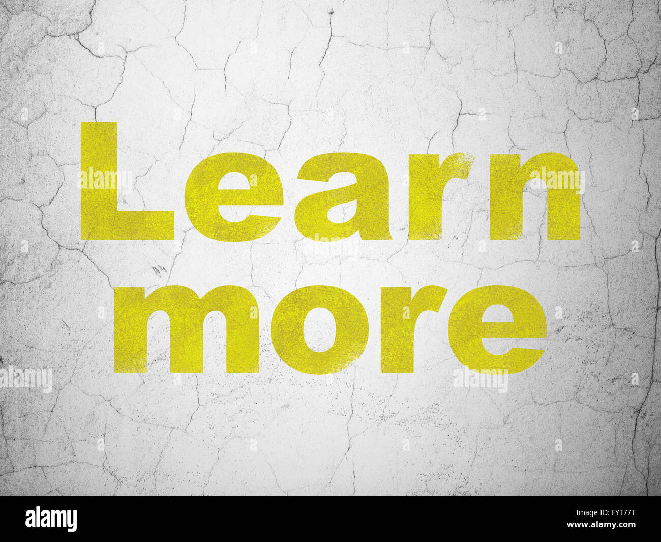 Learning concept: Learn More on wall background Stock Photo - Alamy