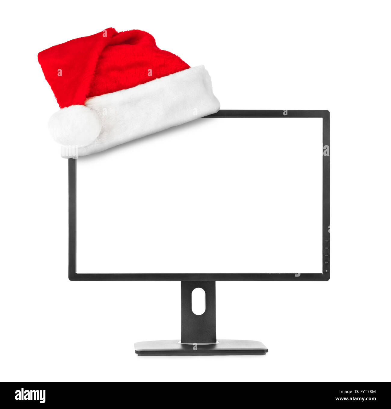 Computer monitor and Santa Claus red christmas hat Stock Photo - Alamy