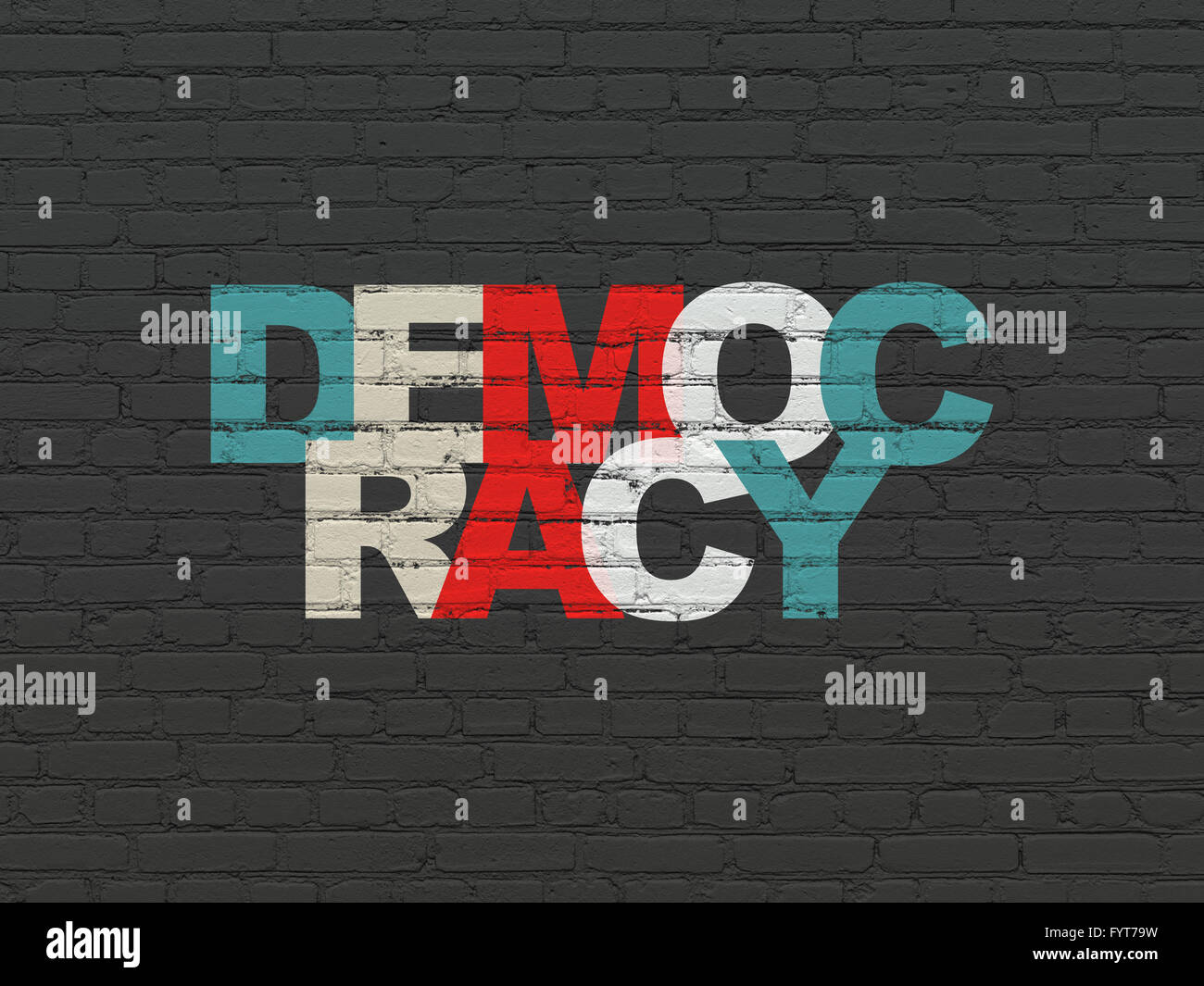 Political concept: Democracy on wall background Stock Photo - Alamy