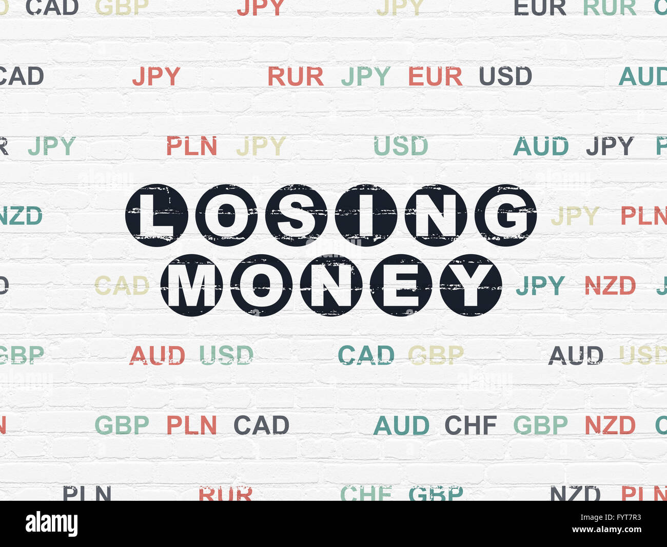 Money concept: Losing Money on wall background Stock Photo - Alamy