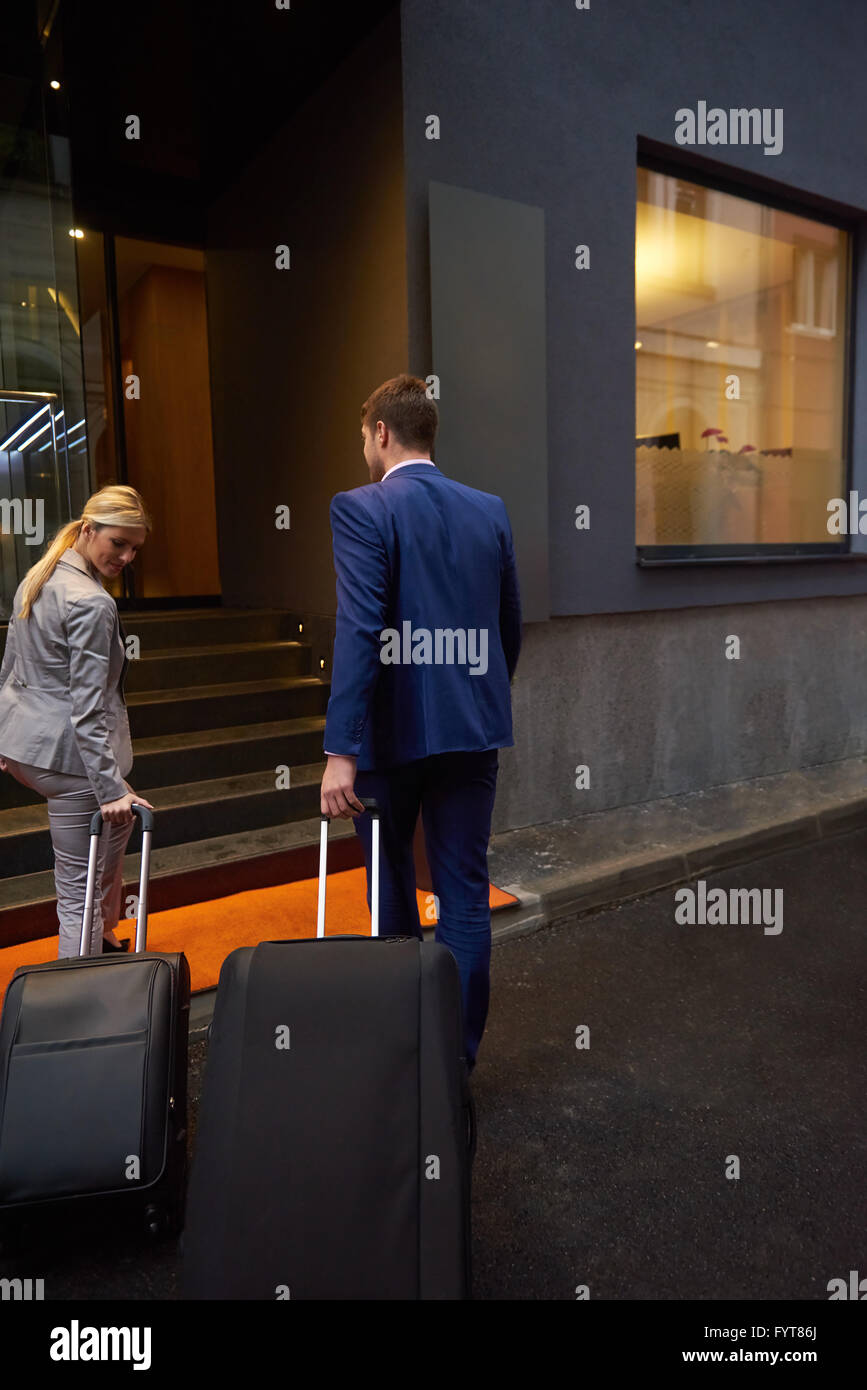 Couple entering hotel hi-res stock photography and images - Alamy