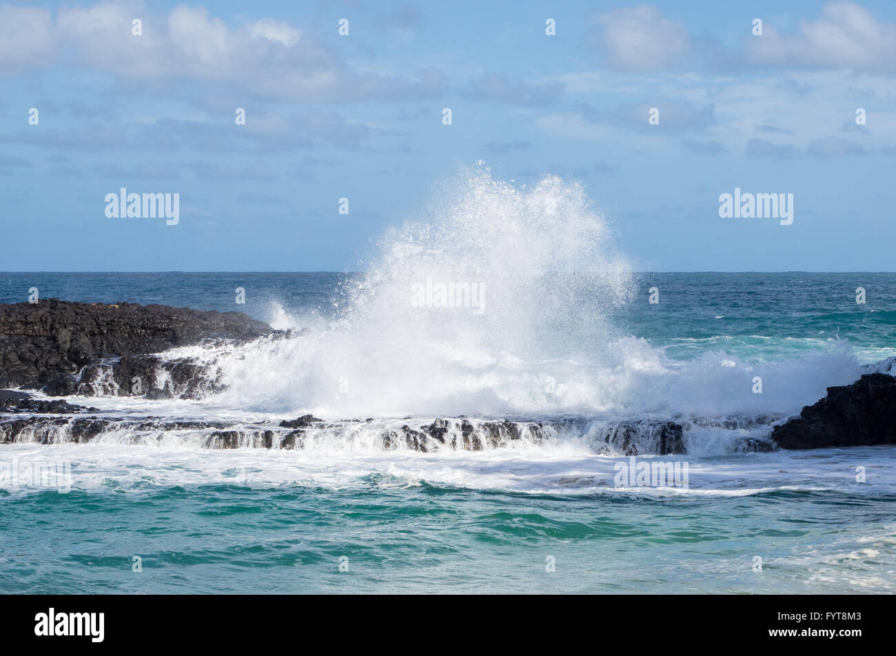 Powerful waves flow over rocks at Lumahai Beach, Kauai Stock Photo - Alamy