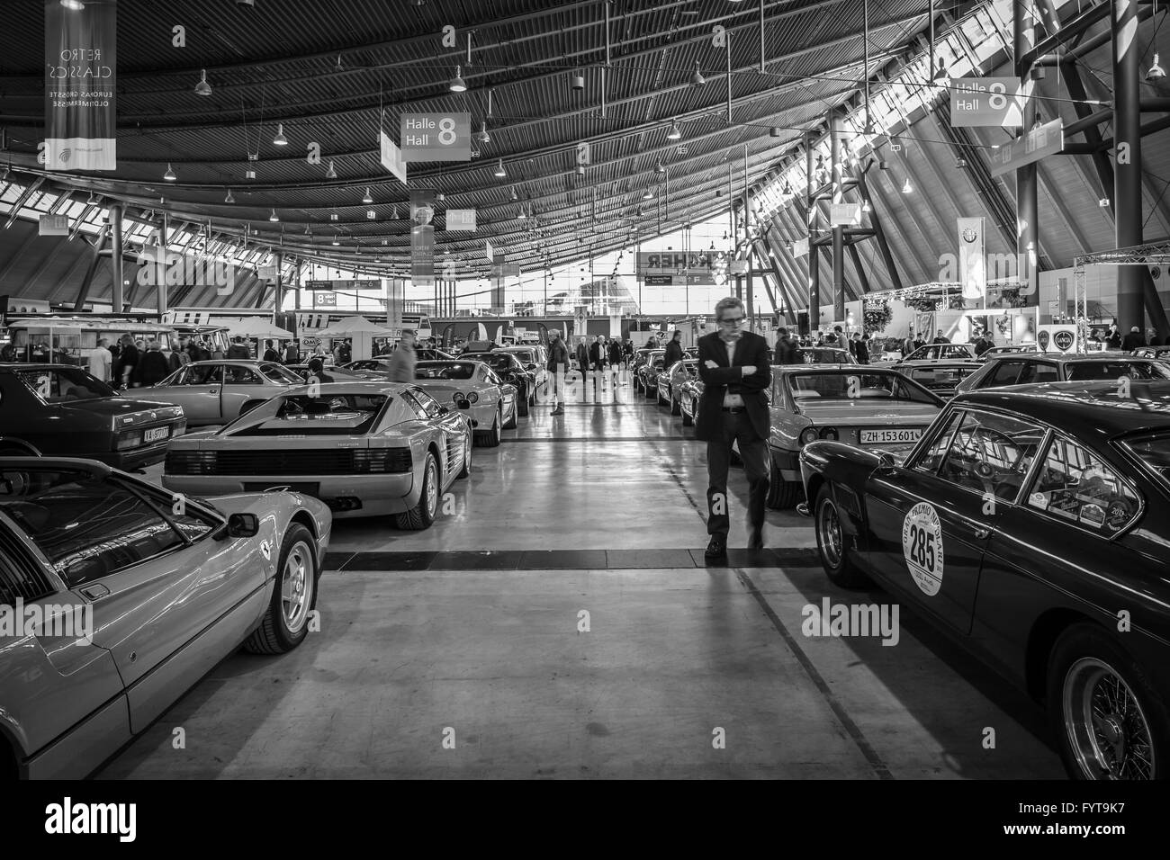 Different cars in the exhibition hall Stock Photo - Alamy