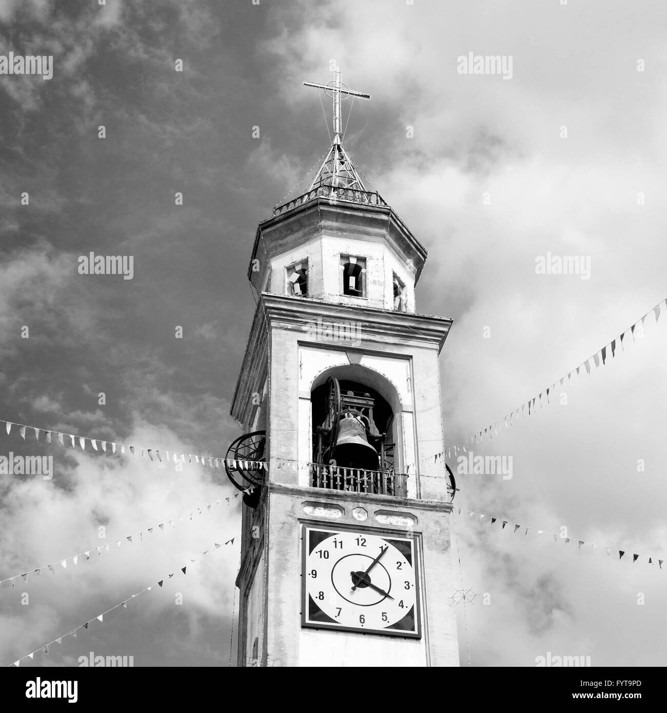 ancien clock tower in italy europe old stone and bell Stock Photo - Alamy